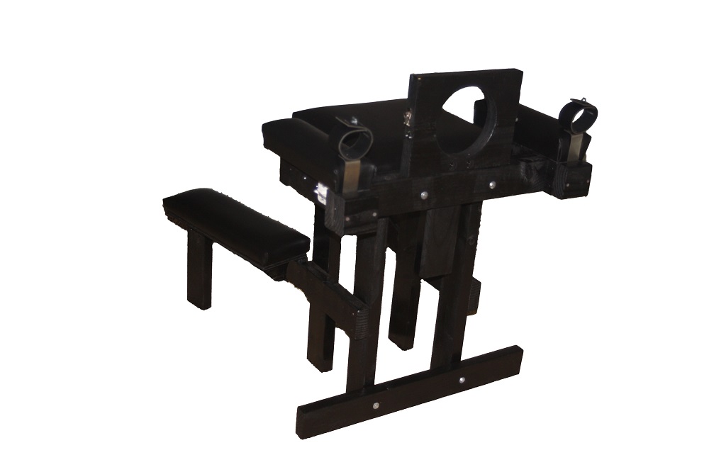 Plus size stockade bench with time release handcuffs, Robospanker.com